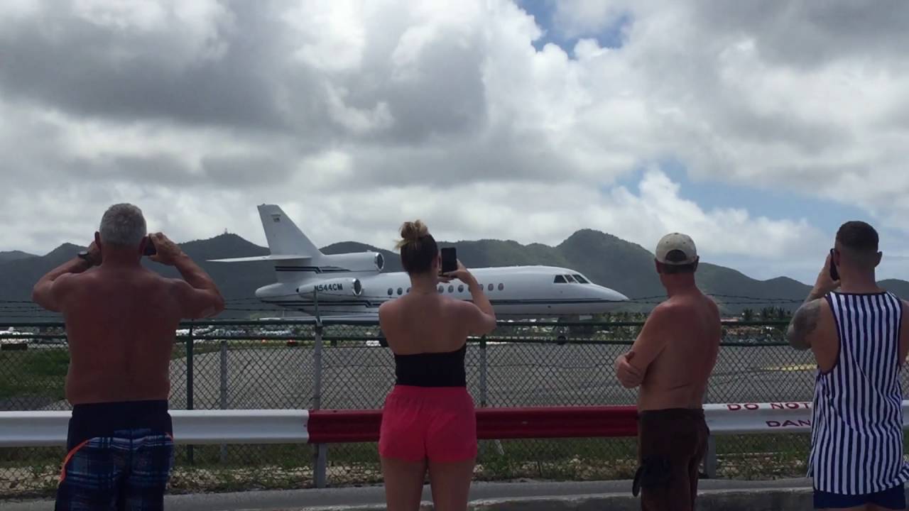 Plane take off at St. Maarten private jet - YouTube