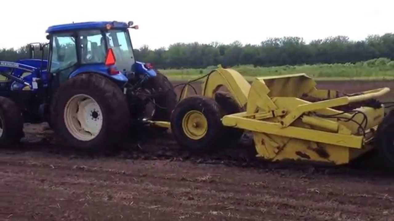 Scraping and reusing field dirt for ruts - YouTube