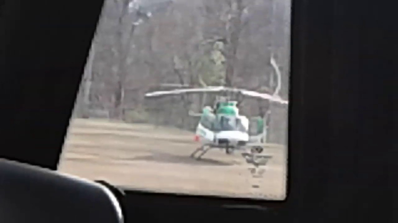 A helicopter at the football field - YouTube