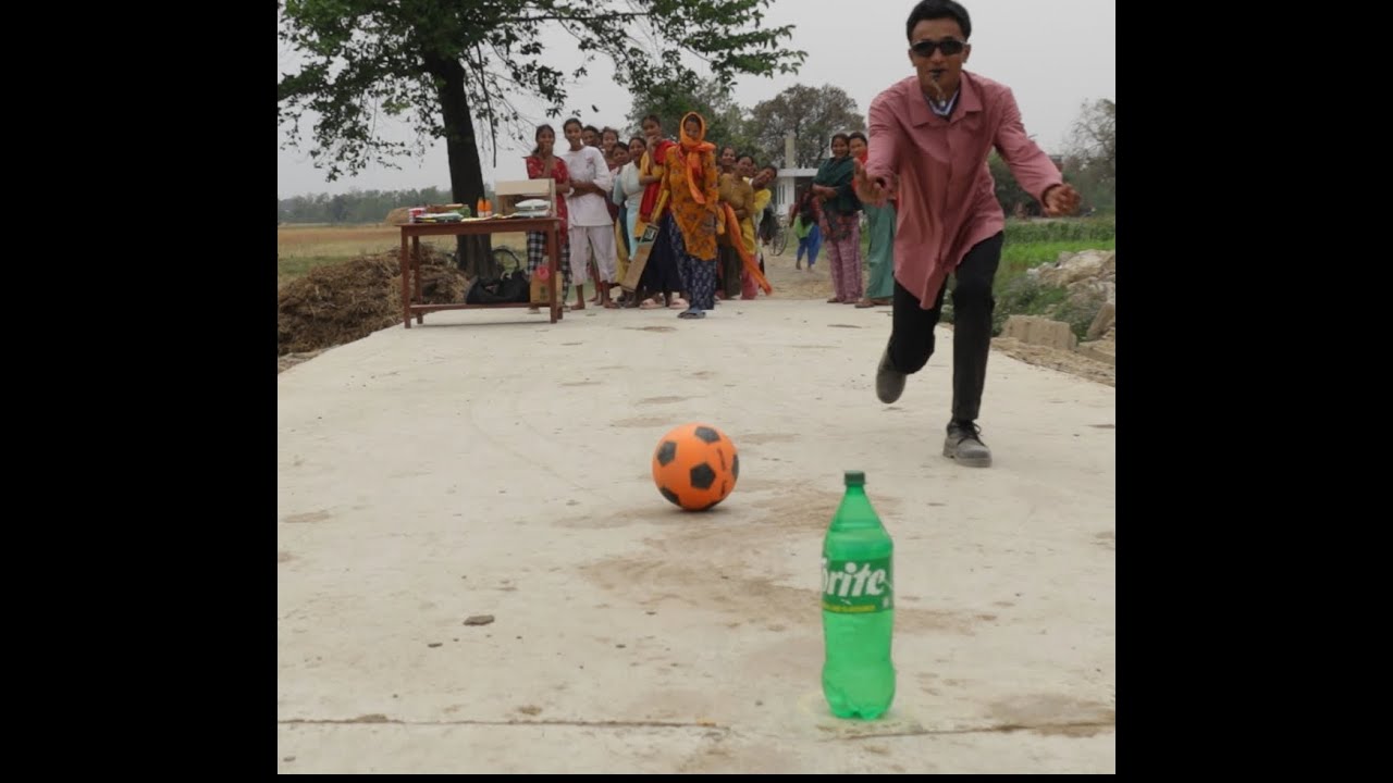 Who can hit the bottle with Football? - YouTube