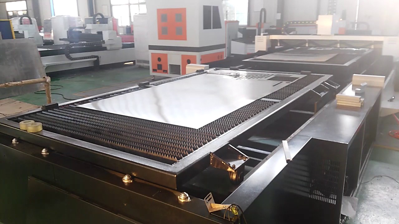 Fiber laser cutting machine with Automatic exchange table for steel ...