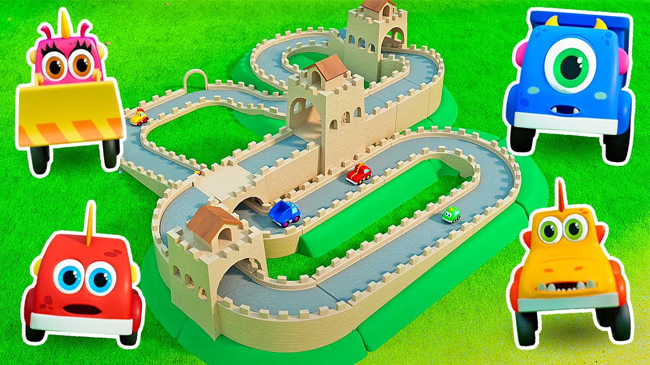 Mocas the little monster cars have a race and play with the toy train ...