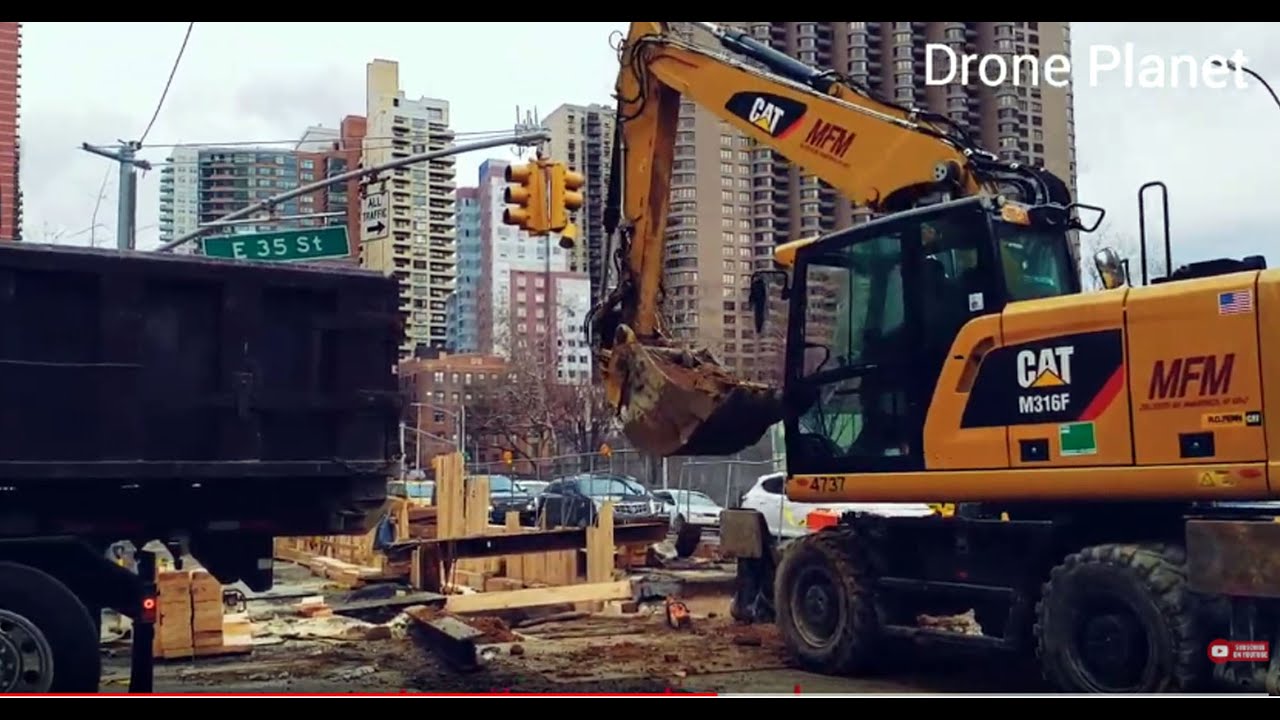 JCB WORKING IN THE STREET- Cat M316F - YouTube
