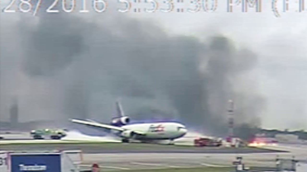 Preview: FedEx Pilots Escape Burning Plane Through Cockpit Window - YouTube