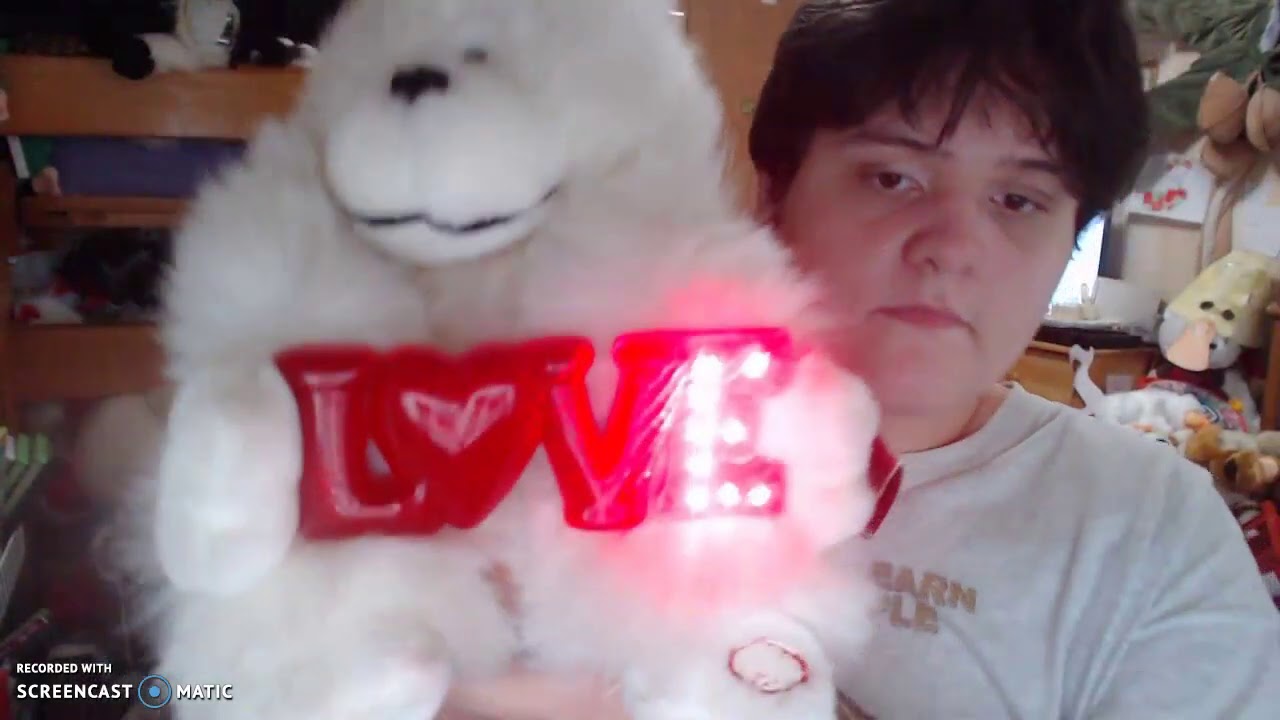 dan dee white gorilla holding love sign - YouTube
