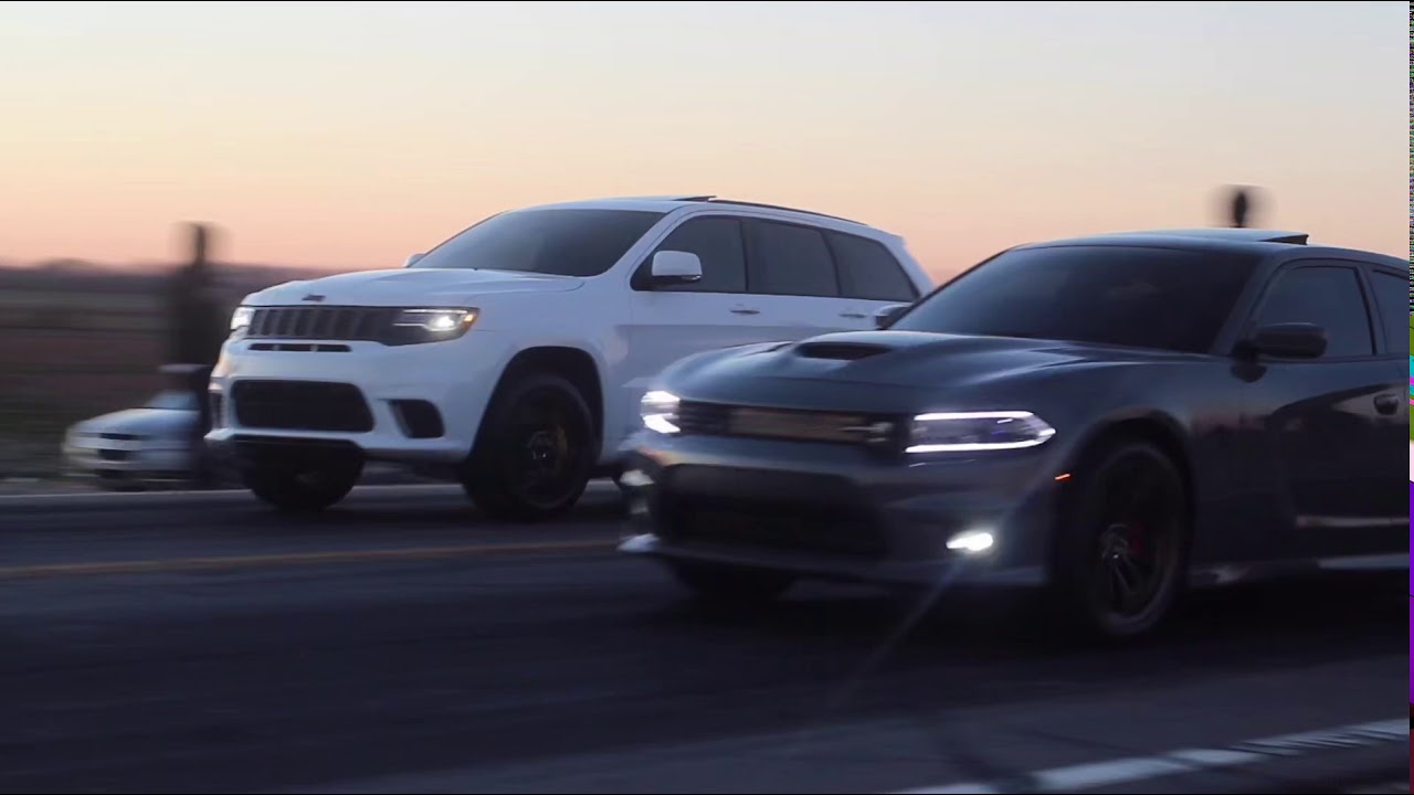 trackhawk vs procharger 392 charger - YouTube