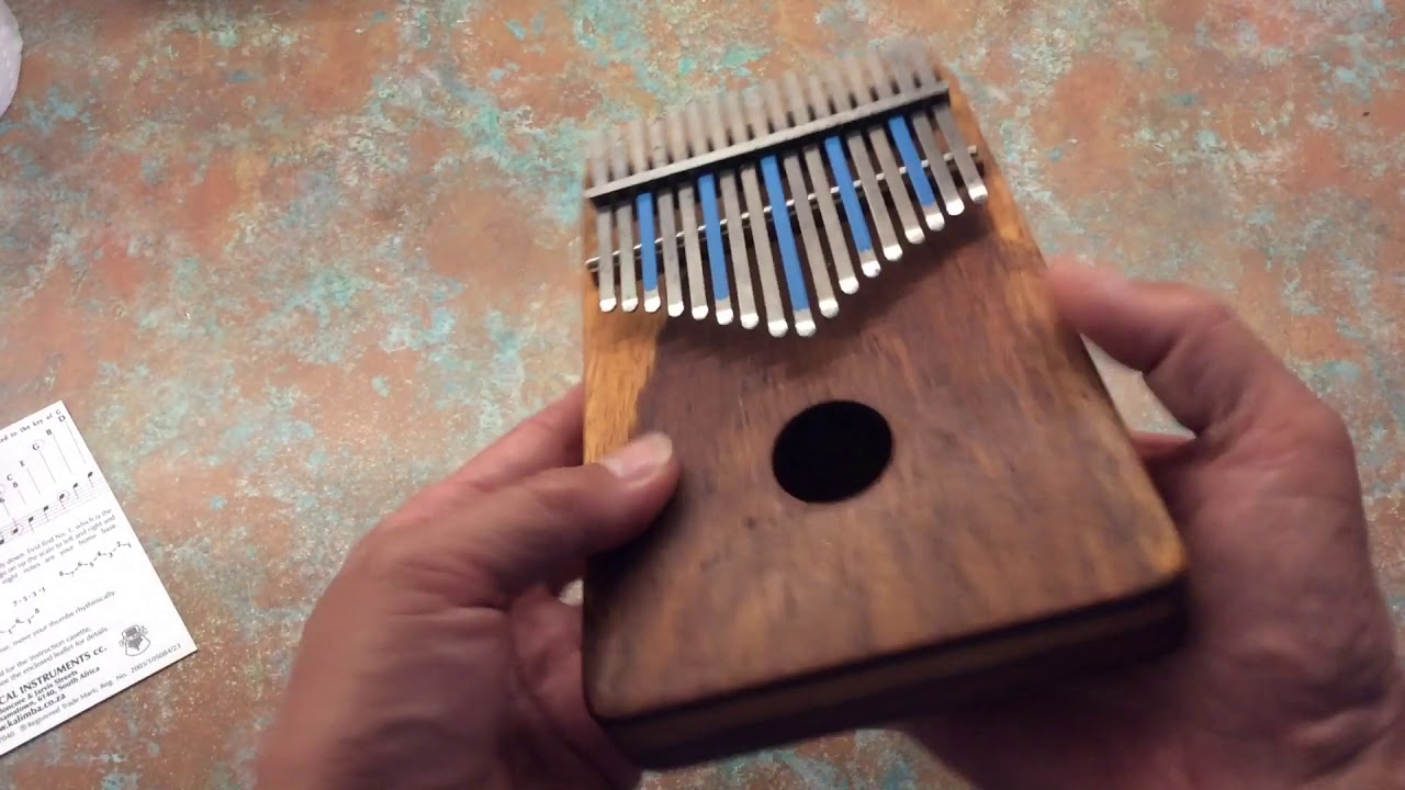 Kalimba Doctor tunes up old Kalimbas - YouTube