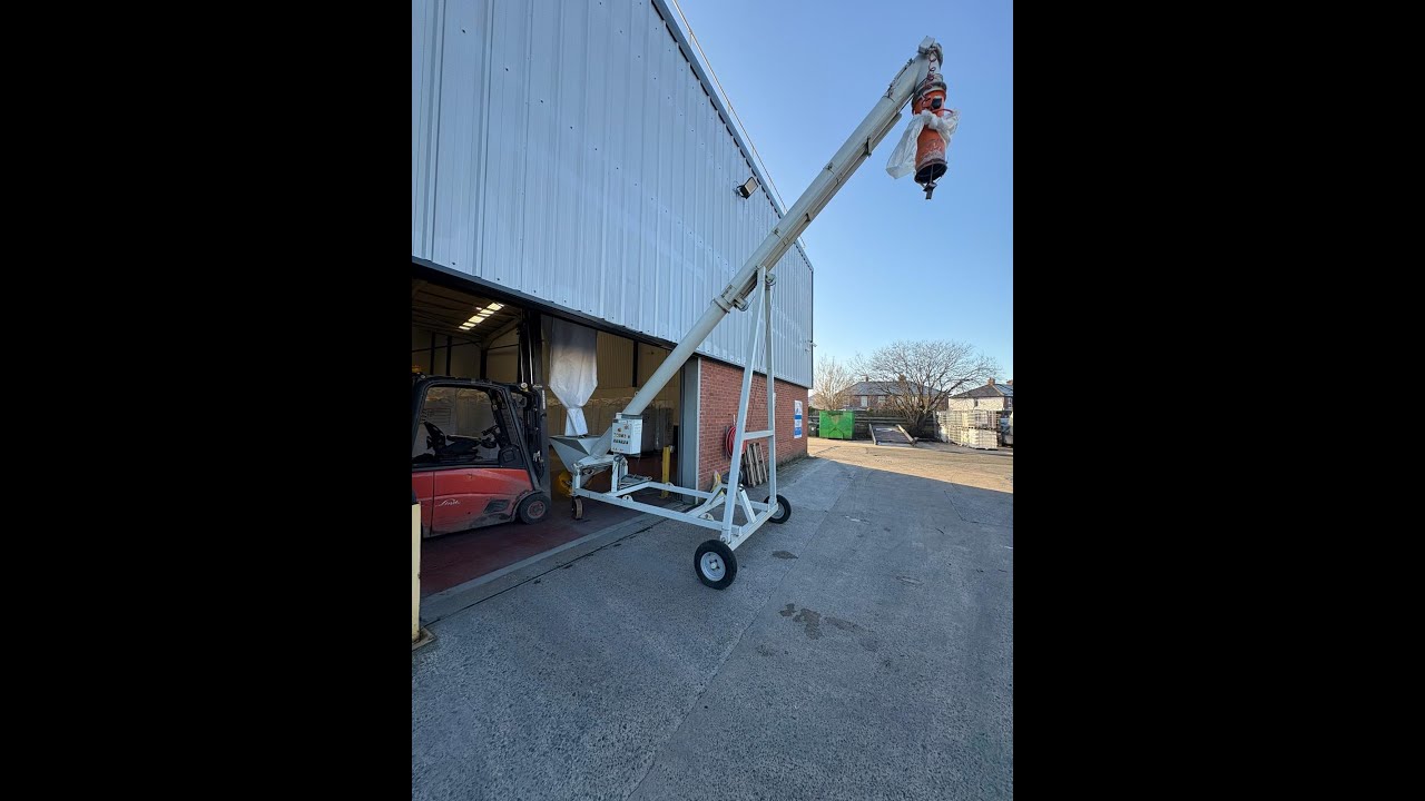 Mobile auger for loading bulk bags into tanker trailers - YouTube