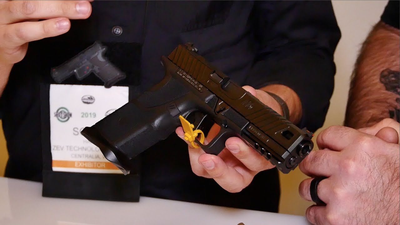 ZEV DROPS GLOCK - and creates their own Original ZEV Pistol the O.Z.9 ...