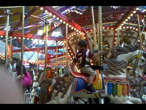 9/18/11 juju n mom on the carousel at az mills - YouTube