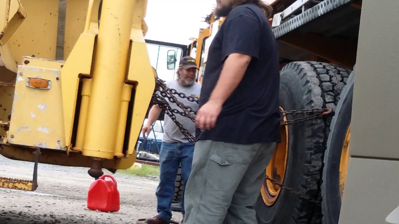 Pulling tire off of 110 ton crane - YouTube
