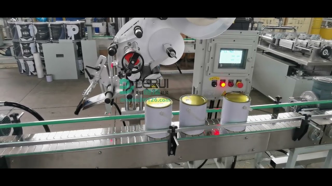 Paint bucket top labeling machine（EX） - YouTube