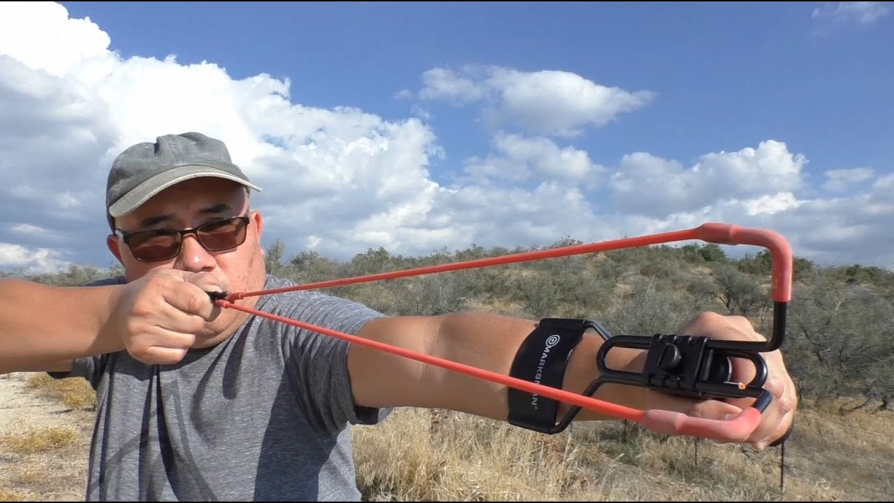 Marksman Slingshot vs Handmade Wooden Slingshot Demonstration - YouTube
