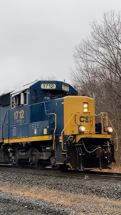 CSX SD40E3 #1712 leading train M438 with 2 YN2s and a friendly crew - YouTube