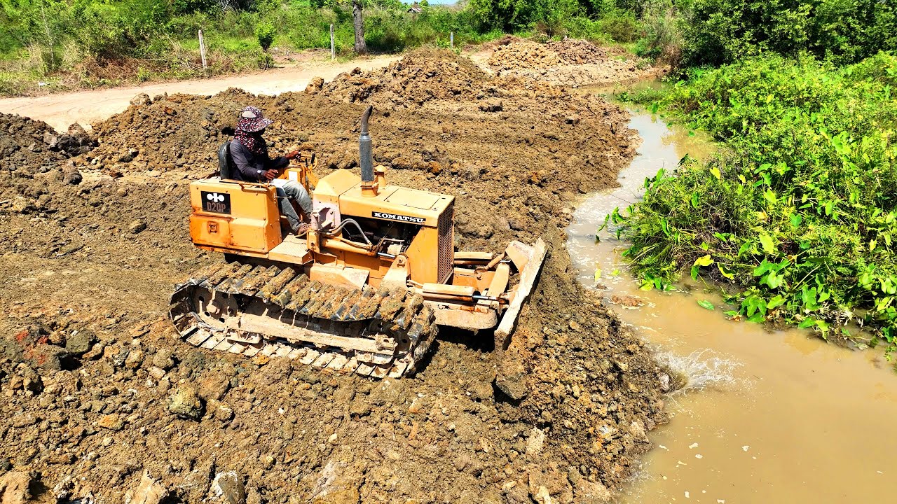 This is the video development city of Cambodia, with Dump truck and D20P Bulldozer operating ...