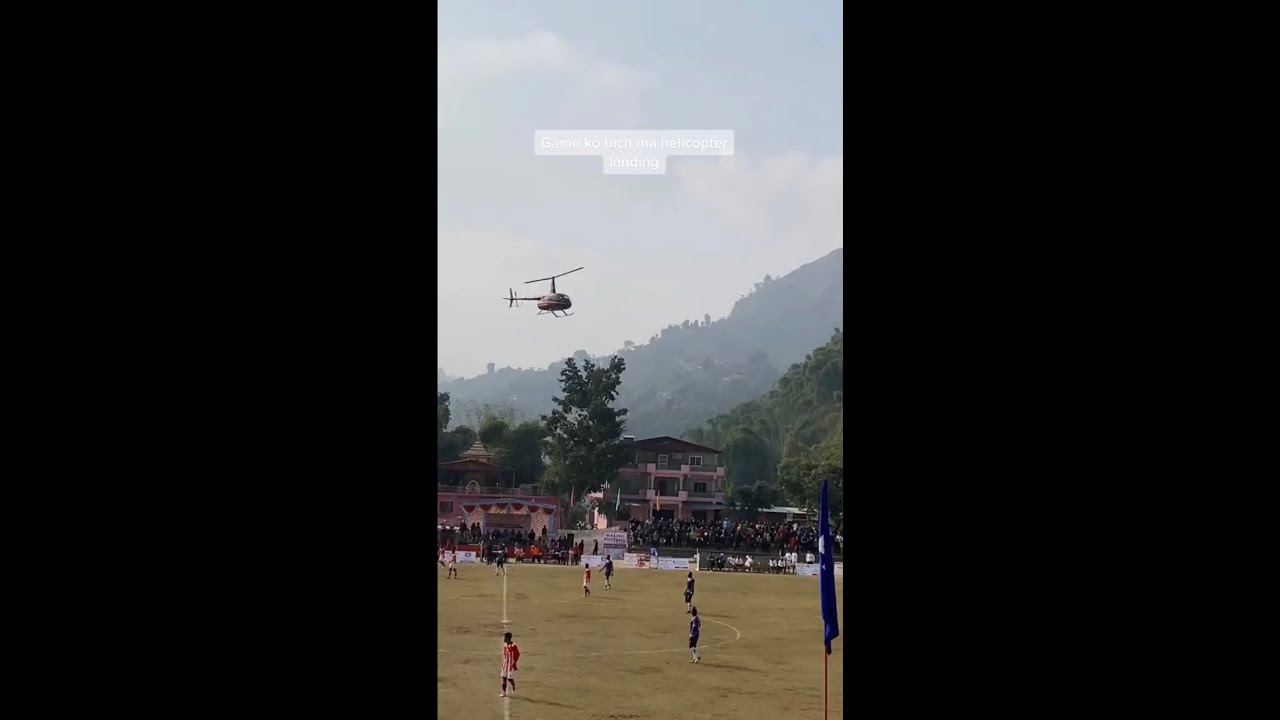 Helicopter landed during a football match - YouTube