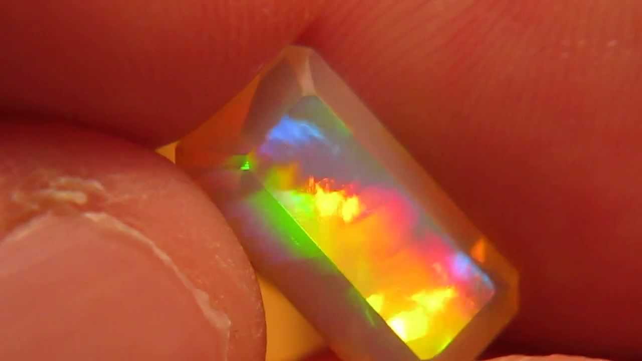1.9ct Brilliant Faceted Emerald Cut Welo Opal - YouTube