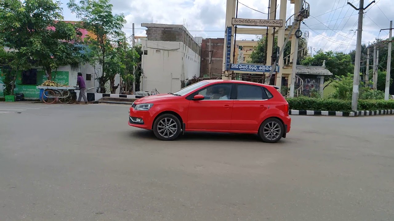 Volkswagen polo Road Presence Flash Red Color Car Looks in Slow Motion ...