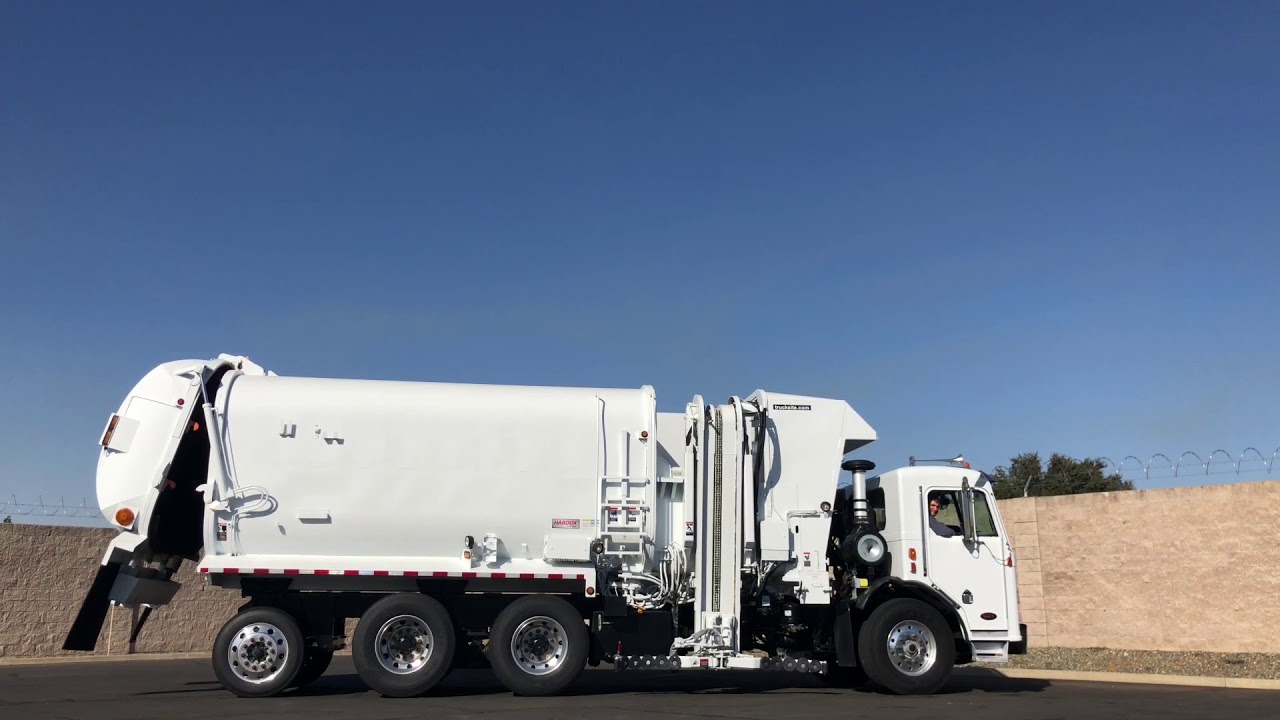 2005 Peterbilt 320 Amrep HX450 Auto Side Loader For Sale - YouTube