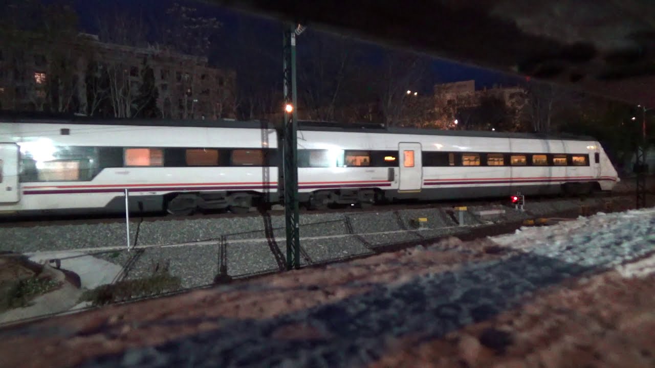 Renfe 599 saliendo de la estacion de Granada - YouTube