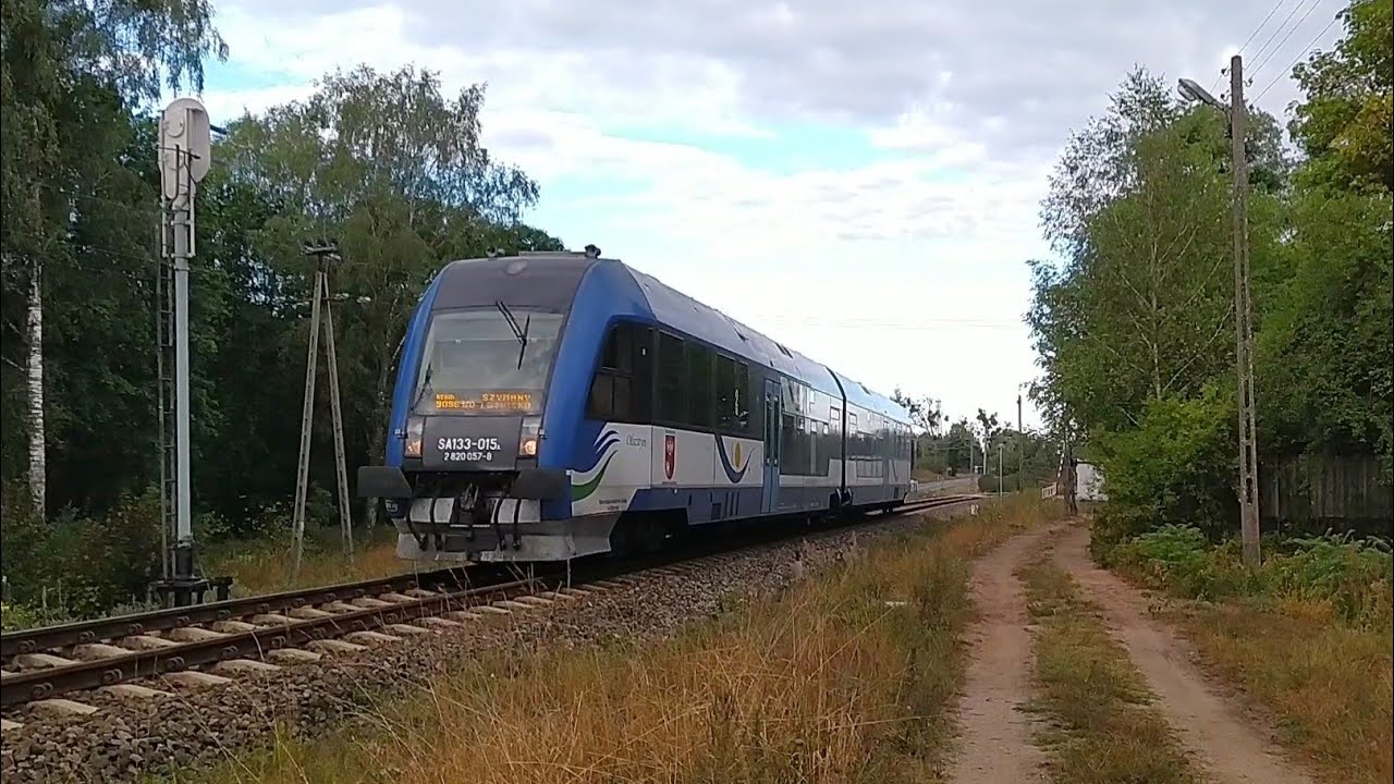 SA133-015 wjeżdża na stację Pasym - YouTube