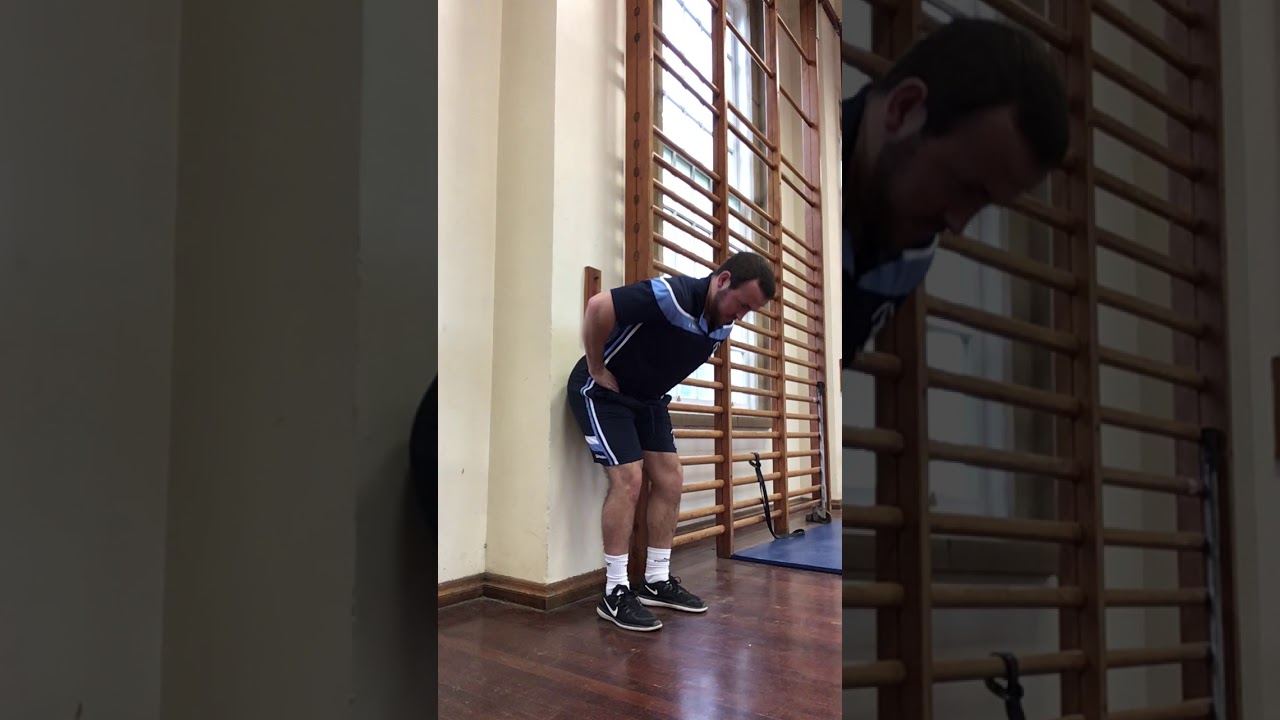 Standing Hip Hinge to Wall - YouTube