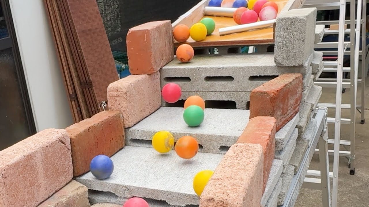 Make a marble run course with a trampoline and stairs. "Improved ...
