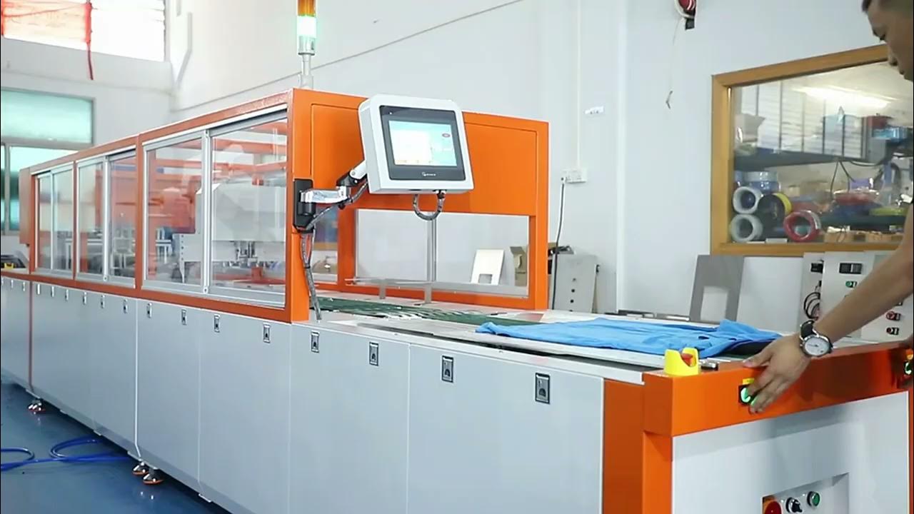 Automatic T-shirt packaging machine folding packer and sealer - YouTube