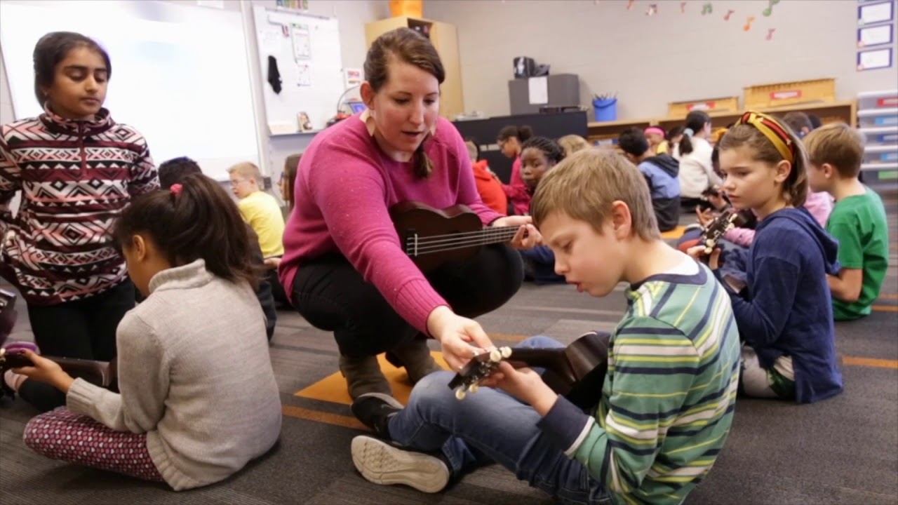 Ukuleles introduced to Borlaug Elementary music class - YouTube