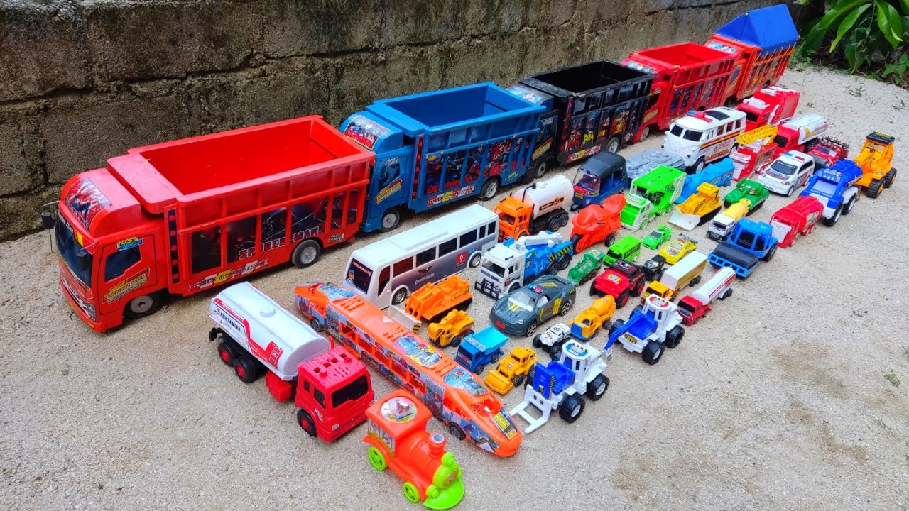 Mobil Truk Tronton Panjang Penuh Mainan Mobilan Helikopter Forklift ...