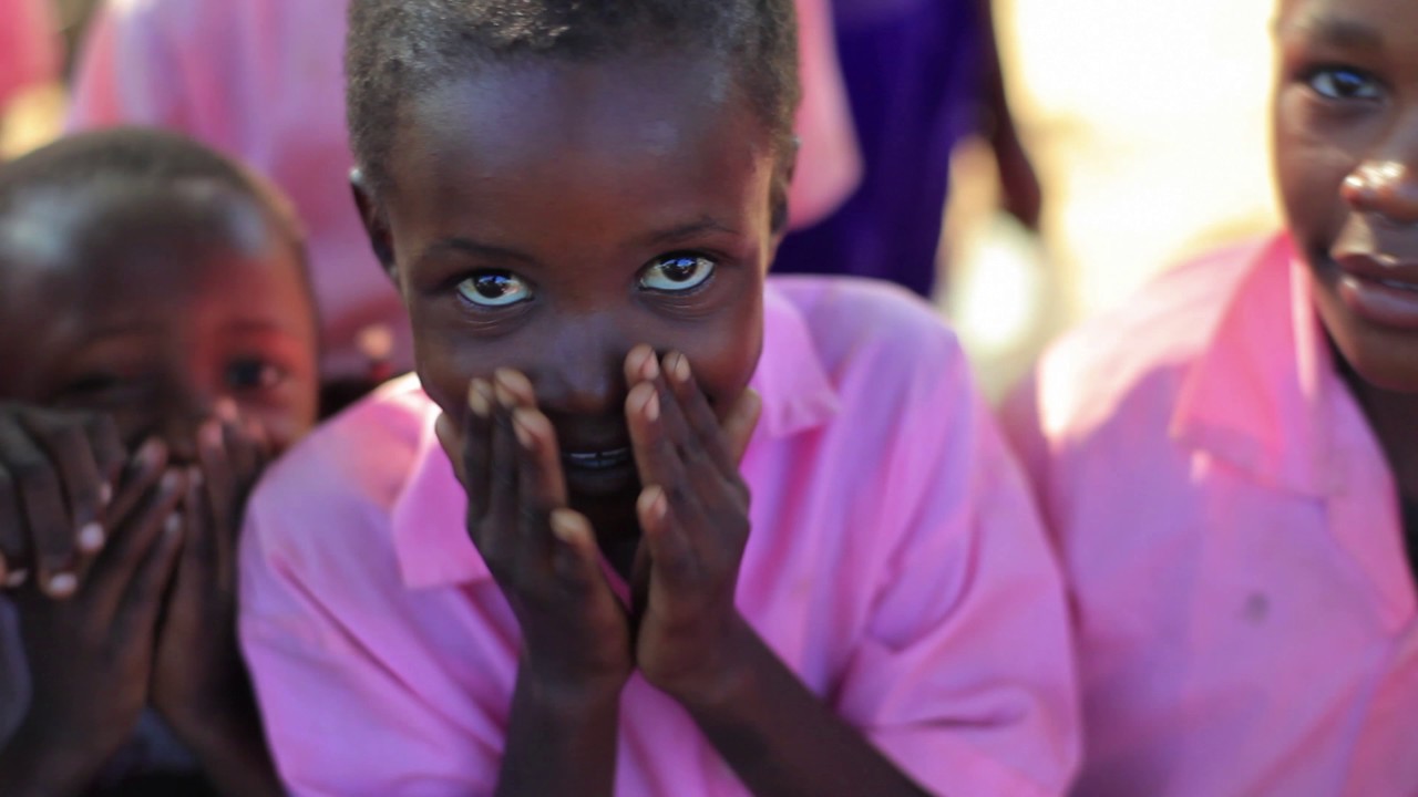 Kids playing near a village in Africa. - YouTube