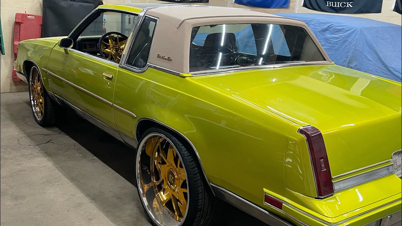 Cutlass on 24” Rucci wheels custom center console and rear deck. - YouTube