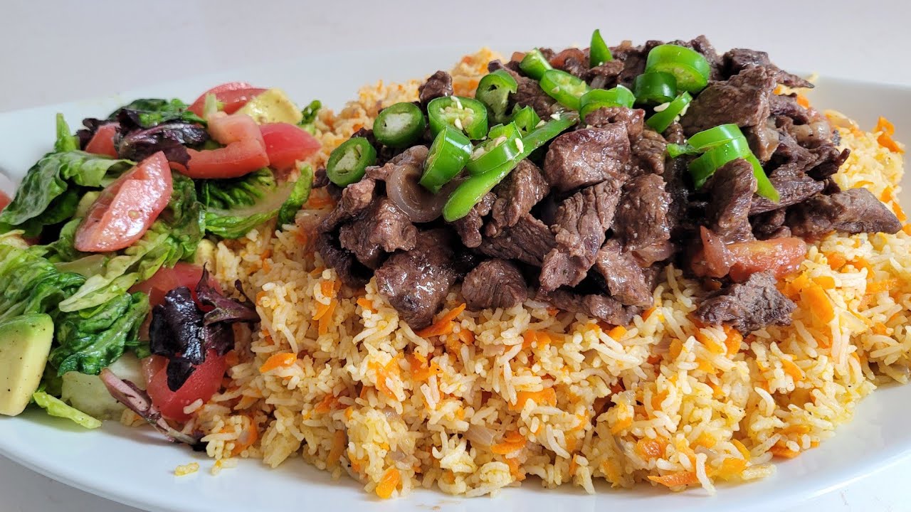 How to make fried rice || ቆንጆ የሩዝ አሰራር || እሩዝ በስጋ || Ethiopian food ...