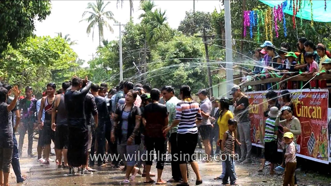 Crowd spray water from pipes at Water Festival, Myanmar - YouTube