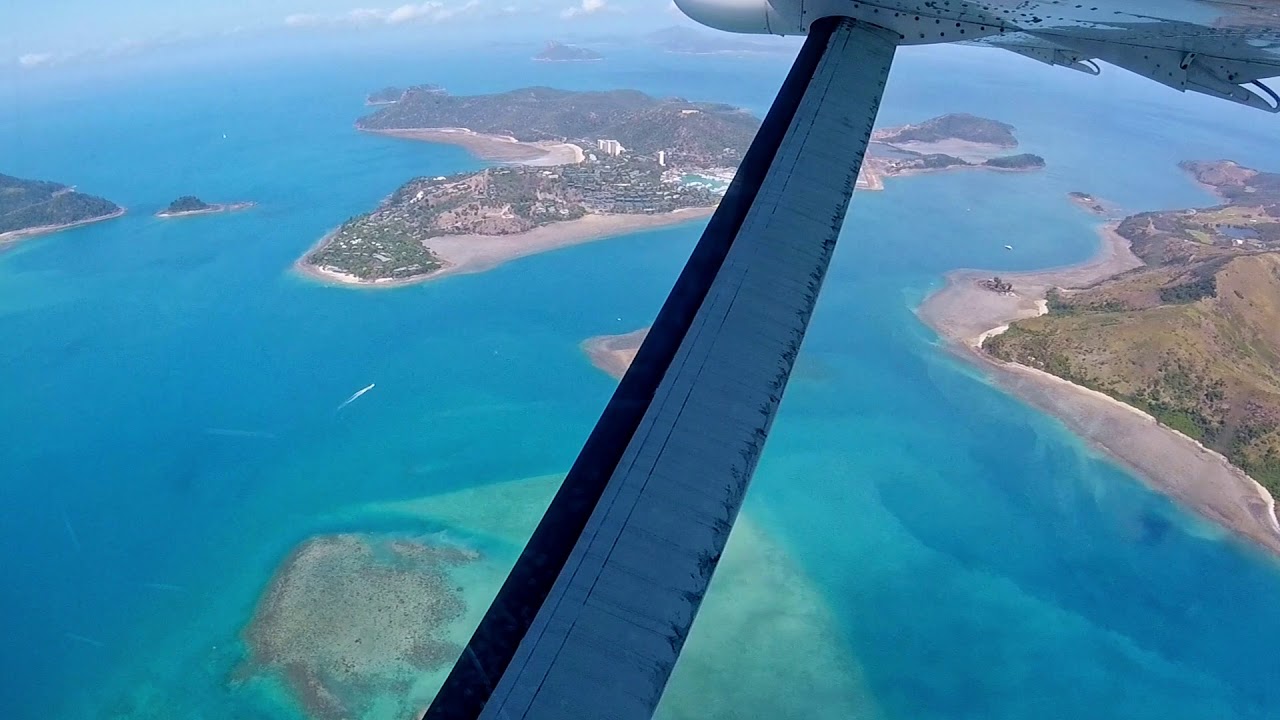Flight over Whitsunday Islands and Great Barrier Reef - YouTube