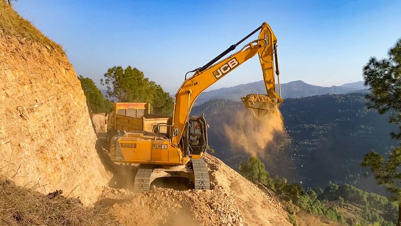 Hilly mountain road construction | JCB excavator machine loading into ...
