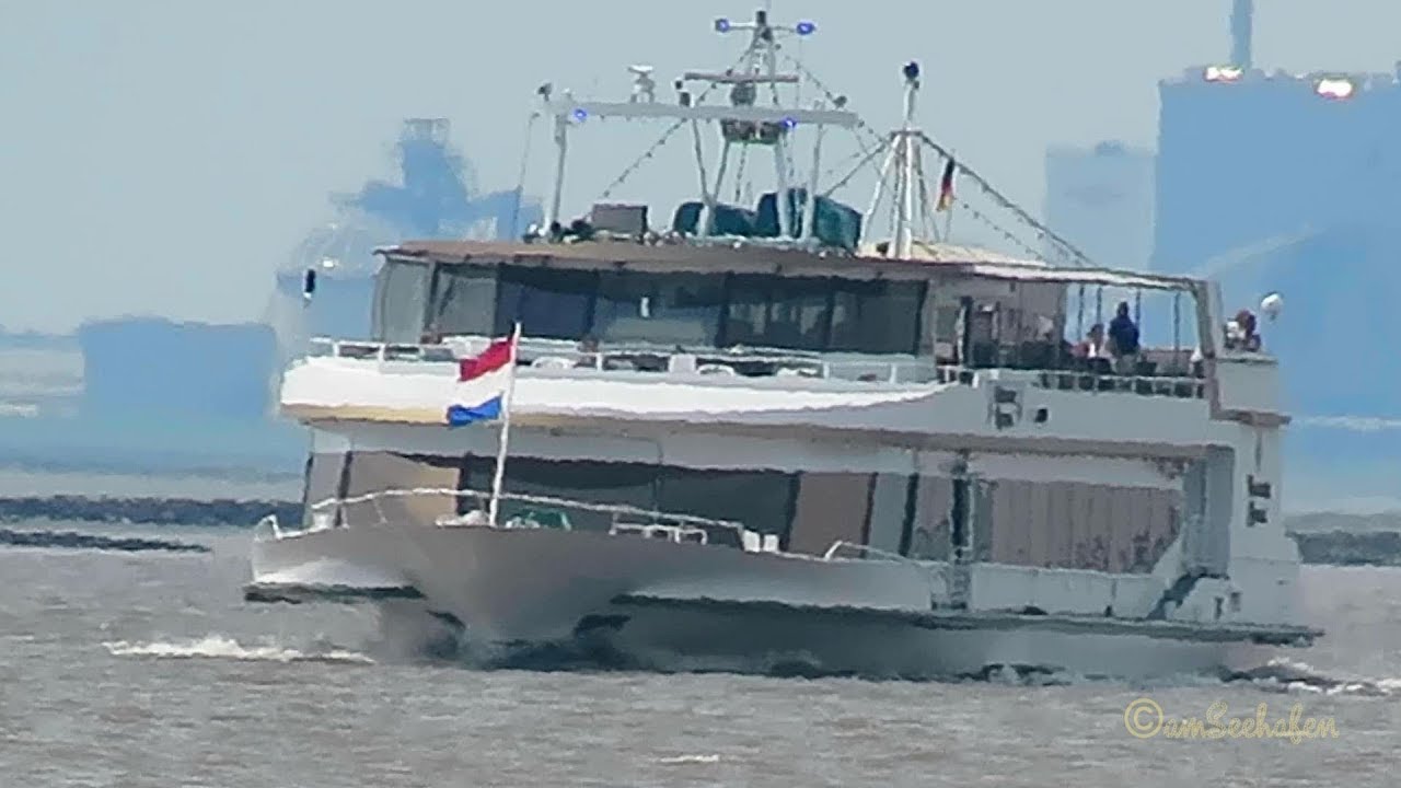inland cruiseliner WARSTEINER ADMIRAL meets Borkum Island Ferry ...