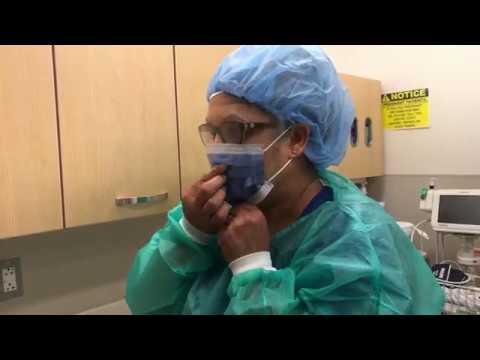 Putting on PPE for Surgery - YouTube