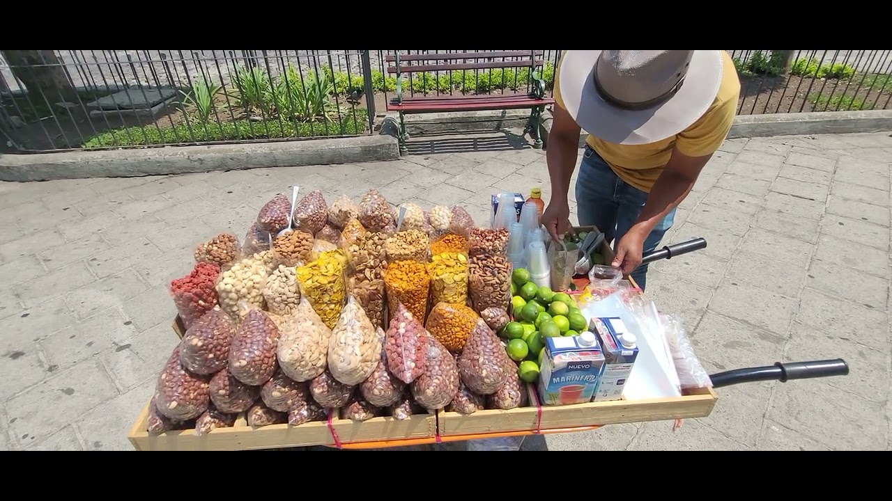 Nuts man in Antigua Guatemala central park - YouTube