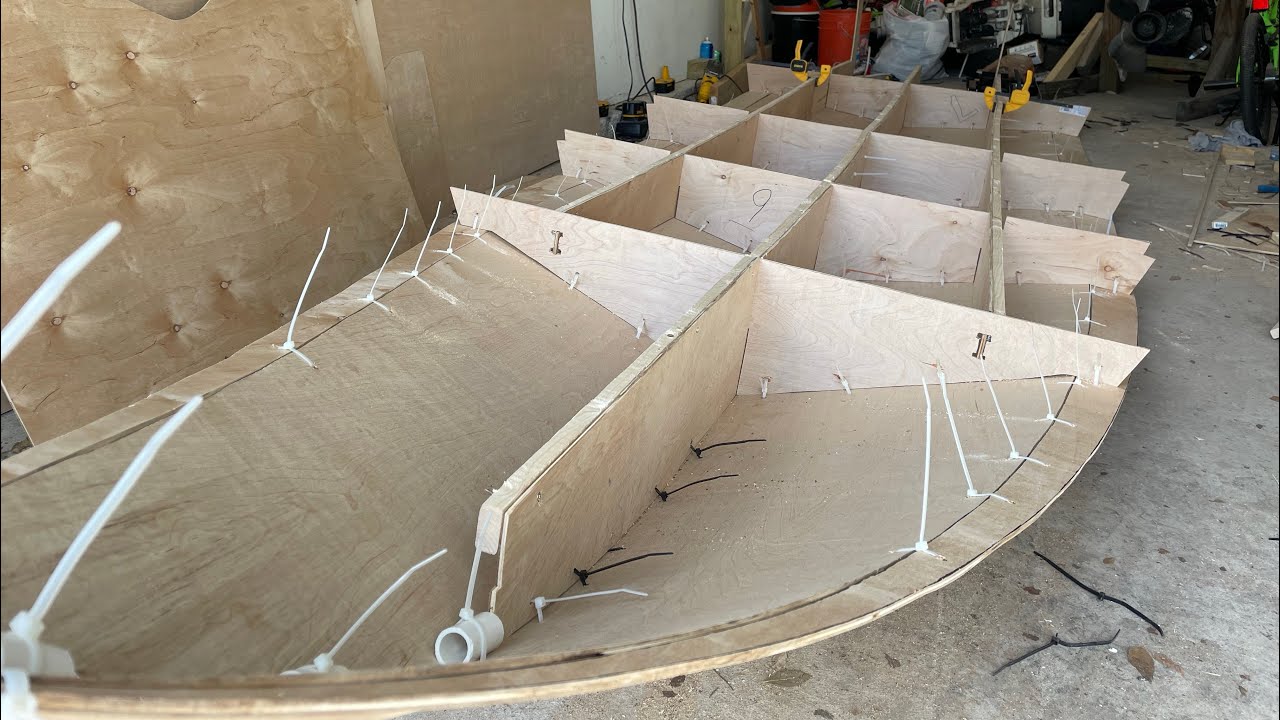How to build a boat skiff part12 Starting to fiberglass stitch and glue ...