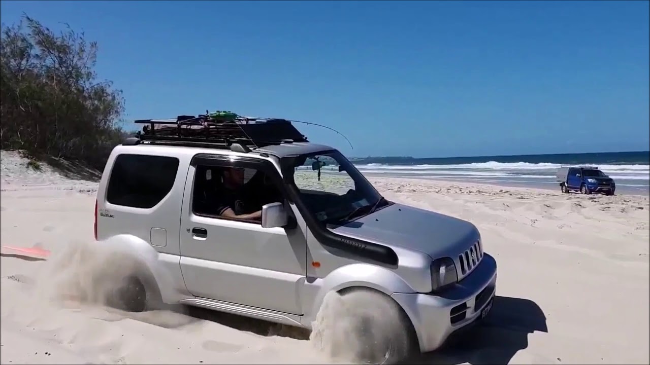 Suzuki Jimny pulls out bogged Ford Ranger - YouTube
