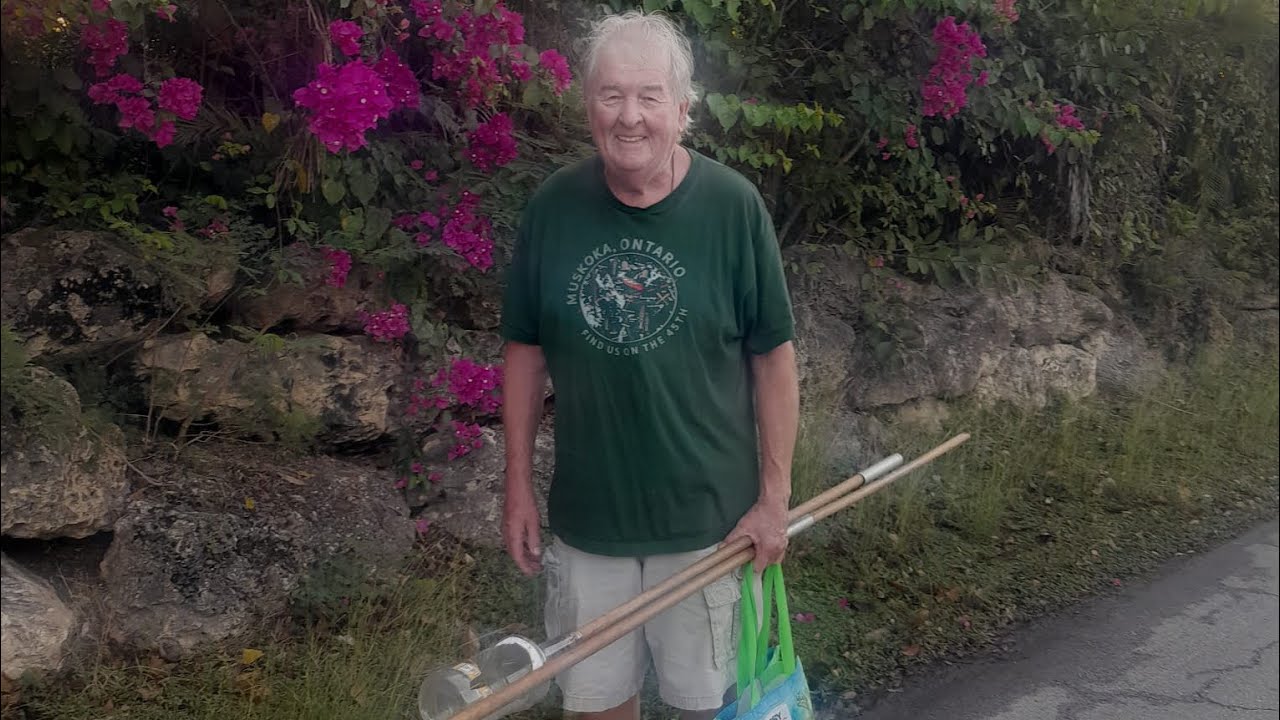 Canadian, Jerry, jerry rigged a mango picker (nicer ones sell in stores ...