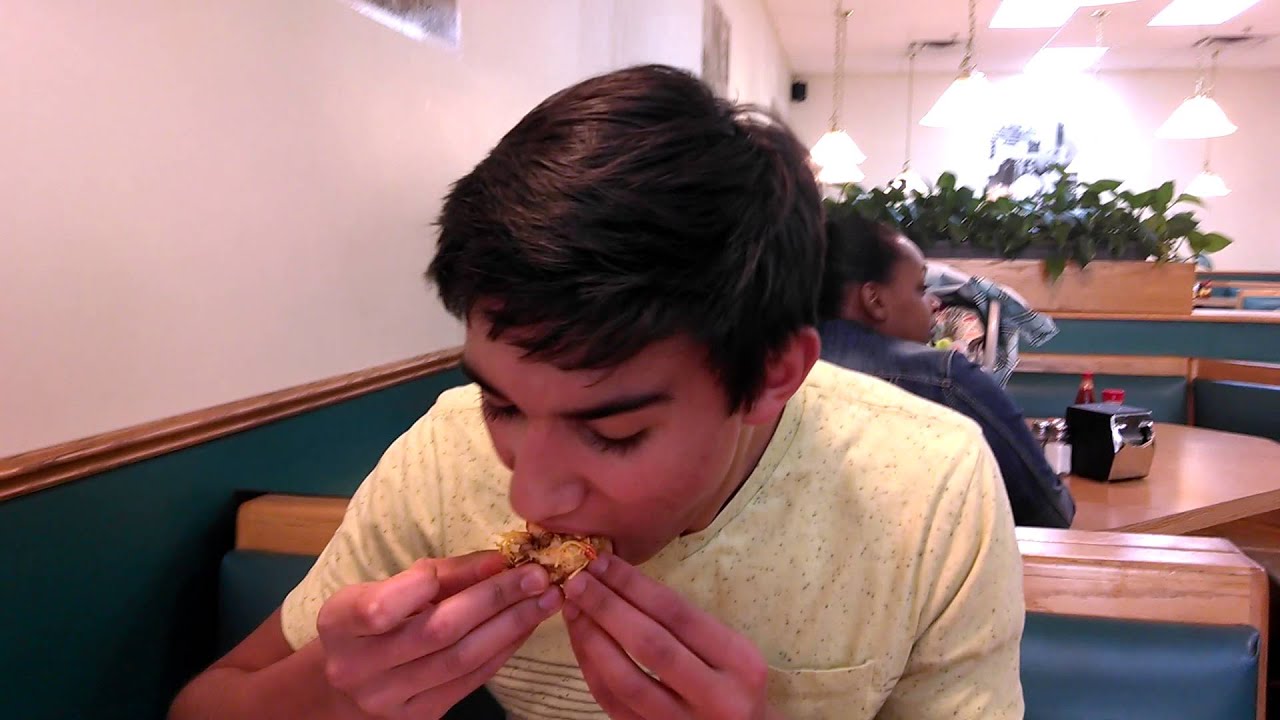 Caleb Fraser eating Coney Island Hot Dog with Tons of Hot Sauce Cayenne ...