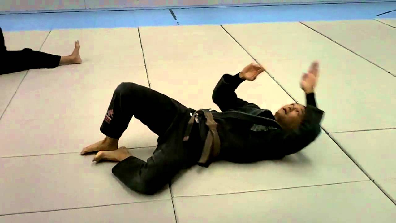 BJJ Breakdown: Details to the Buck and Roll Escape from Bottom Mount ...