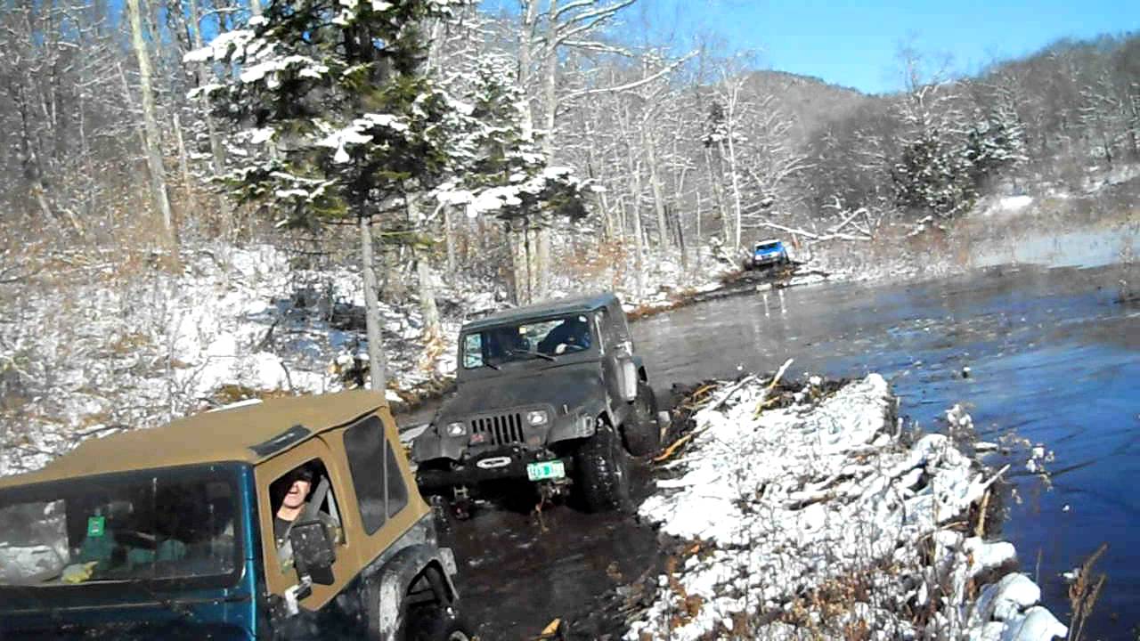 Crossing beaver pond, VT off road - YouTube