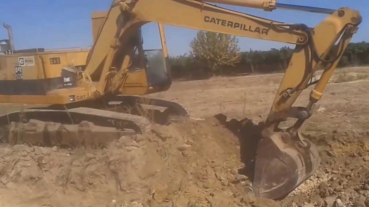 Caterpillar 215 - YouTube