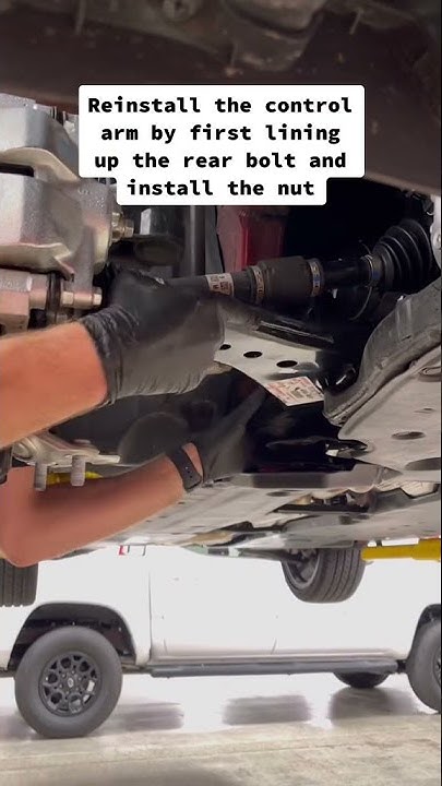 how to replace the lower control arm - YouTube