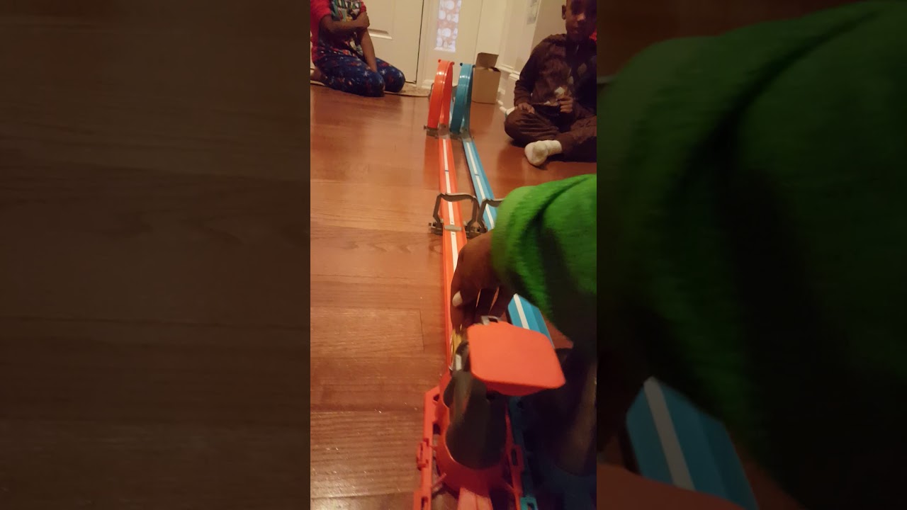 Mom and Dad racing on the Hot Wheels - YouTube