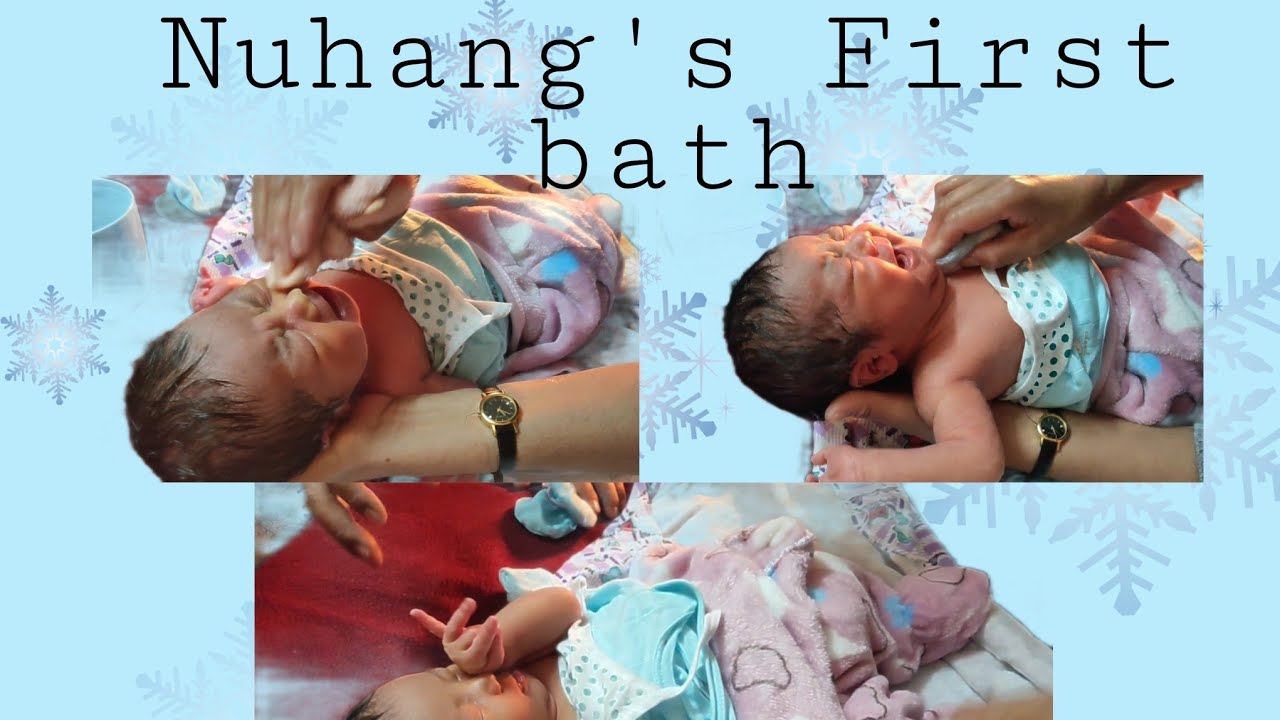 Nuhang's First bath.. Receiving gift from his Dawa Dema..@Suming ...