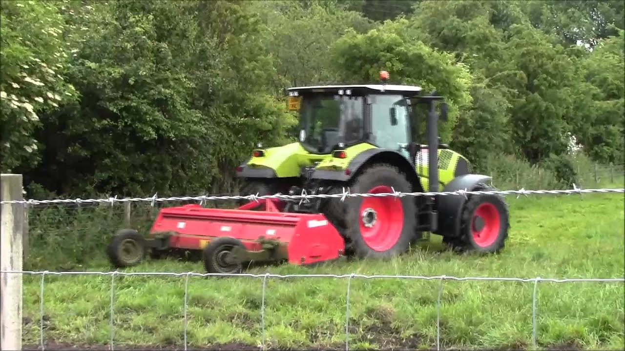 Claas 630 Arion Tractor Brand New cutting grass with KRM Topper - YouTube